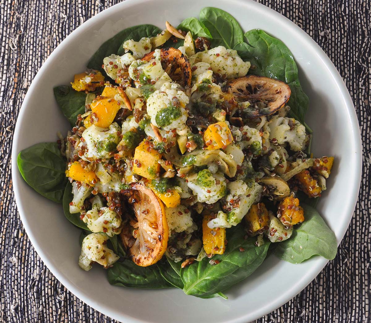 Cauliflower, Quinoa & Butternut Squash on a bed of Baby Spinach ...